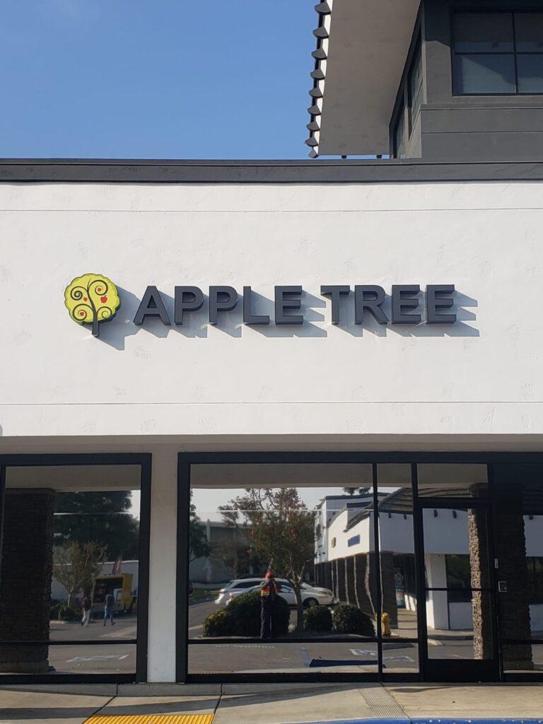 Front lit channel letters light up the Apple Tree - Premium Solutions